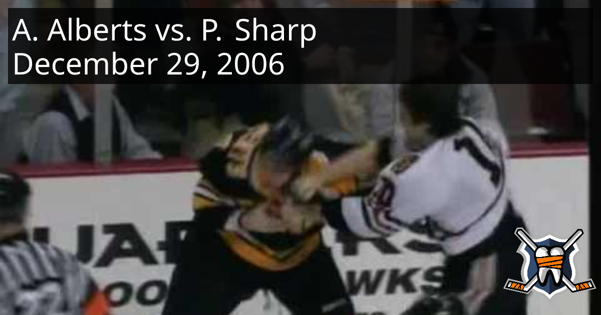 Andrew Alberts vs. Patrick Sharp, December 29, 2006 - Boston Bruins vs ...